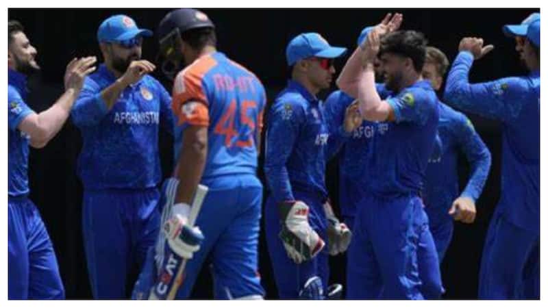 Farooqi unleashes John Cena's celebration after dismissing Rohit Sharma ...