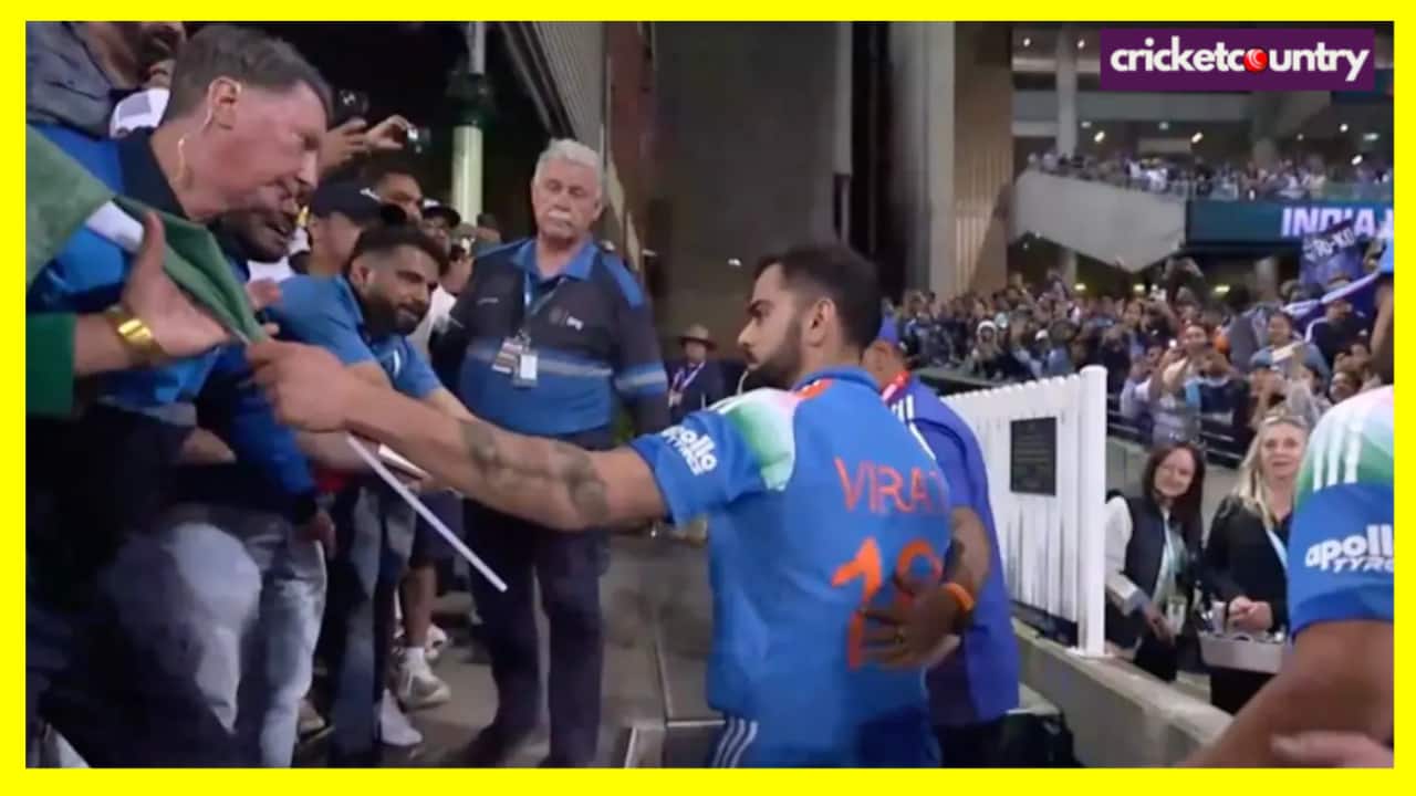 Watch: Virat Kohli picks up Indian flag after Sydney ODI win against ...